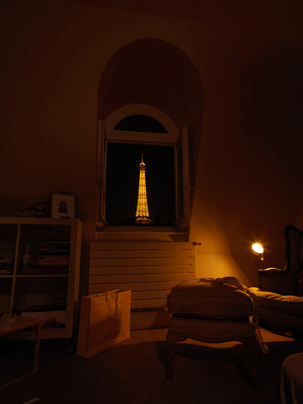 A View of the Eiffel Tower As Seen Through Various Windows in Paris ...